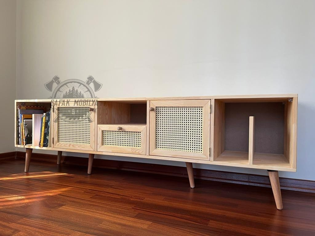Wooden bookshelf with partitioned cane-detailed TV unit